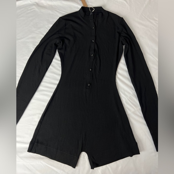 SKIMS | Pants & Jumpsuits | Skims Soft Lounge Ribbed Long Sleeve Onesie ...